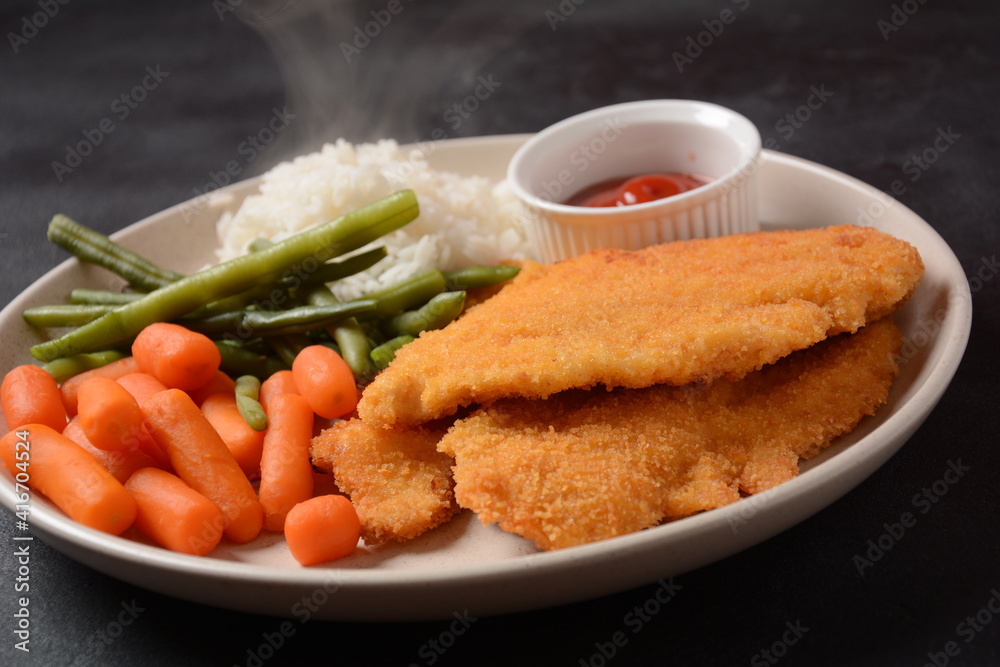 Israeli schnitzel made of chicken or turkey breast, coated with a ...