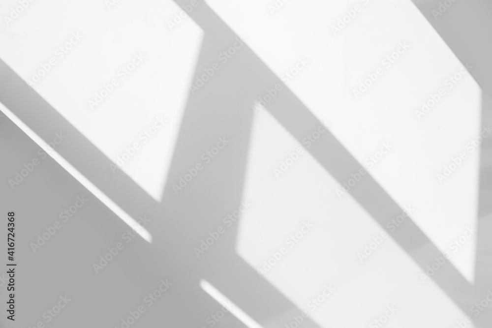 Abstract shadow and striped diagonal light background on white wall ...