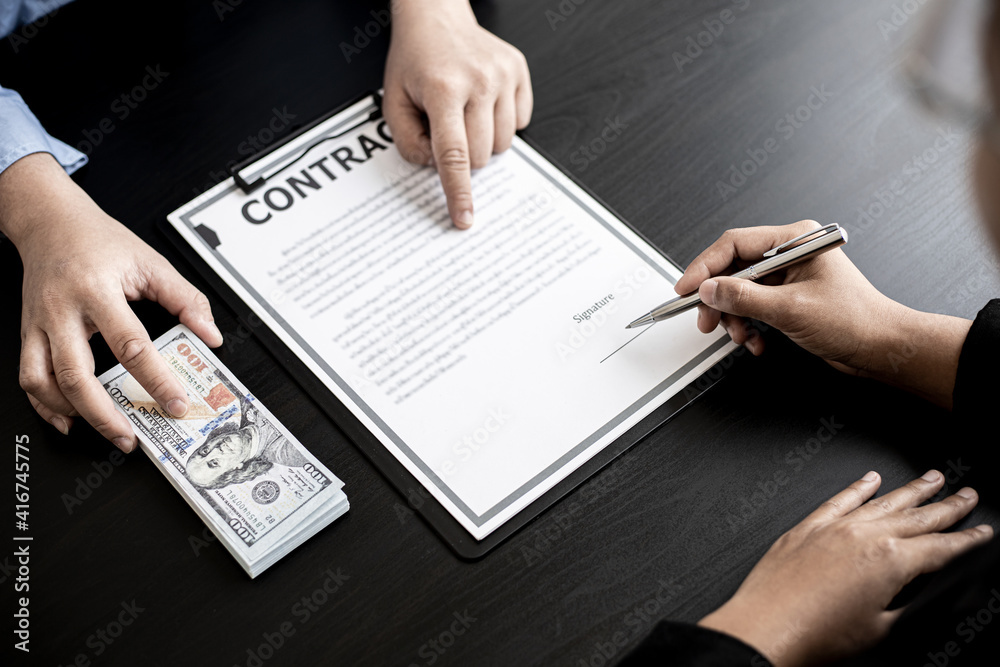 Business women are signing a joint corruption agreement with business ...