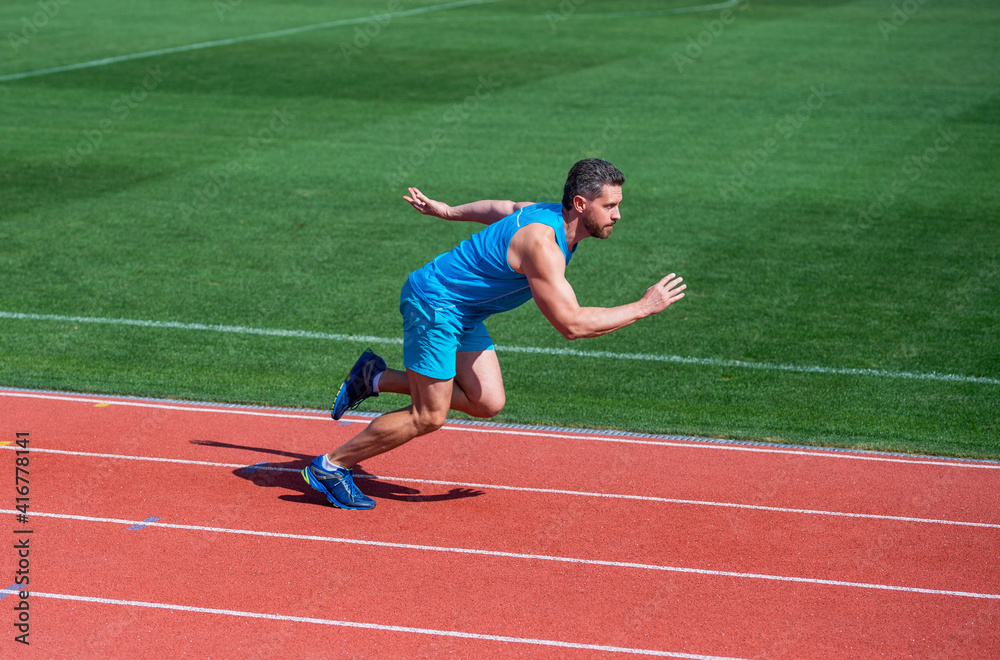 Runner at finish. Athlete runner prepare to race at stadium. Running ...