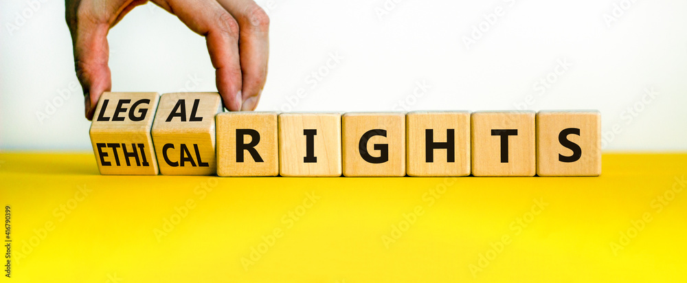 Ethical or legal rights symbol. Businessman turns wooden cubes and ...