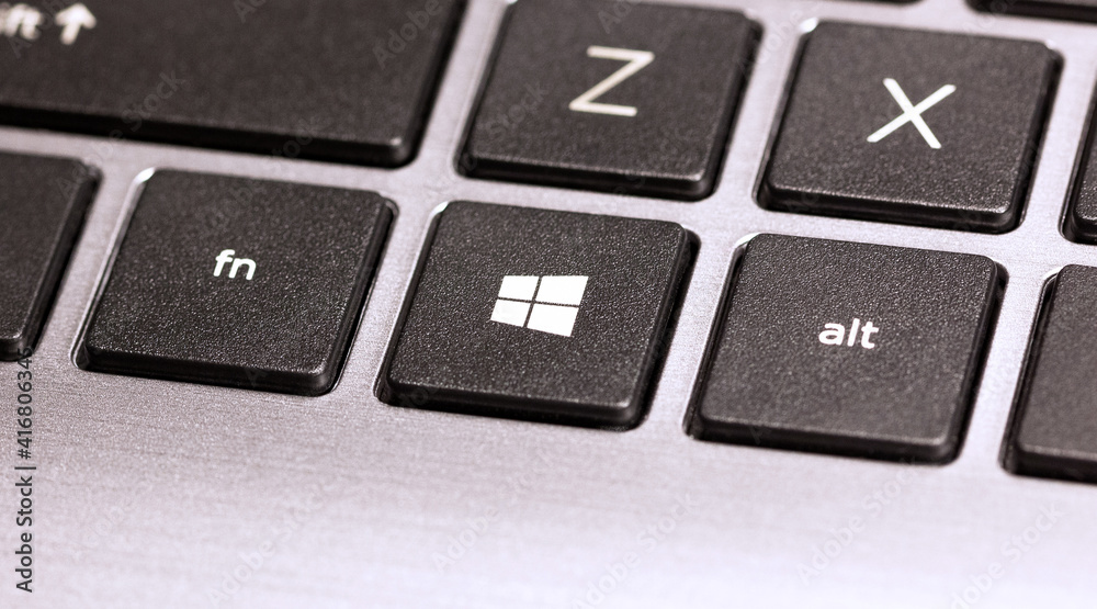Microsoft Windows 10 OS key on a modern laptop keyboard, macro, closeup ...