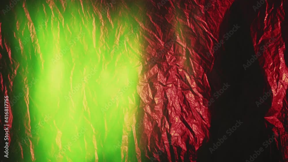 Wrinkled texture overlay. Lens flare effect. Neon green glow on red ...