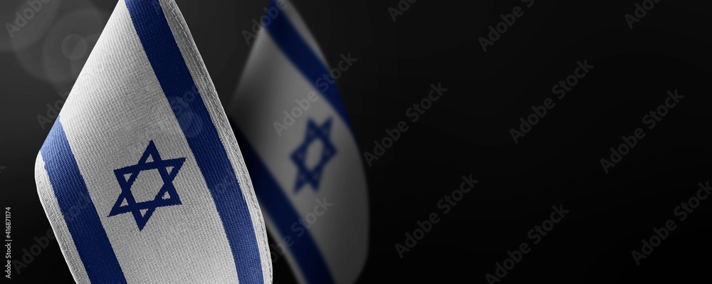 Small national flags of the Israel on a dark background Stock Photo ...