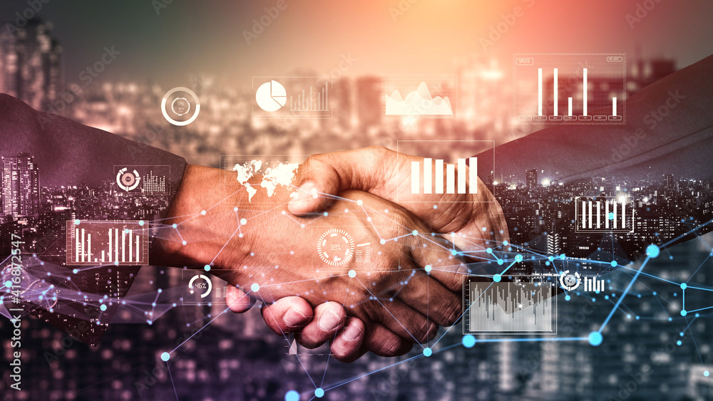 Foto de Imaginative visual business handshake with computer graphic of ...