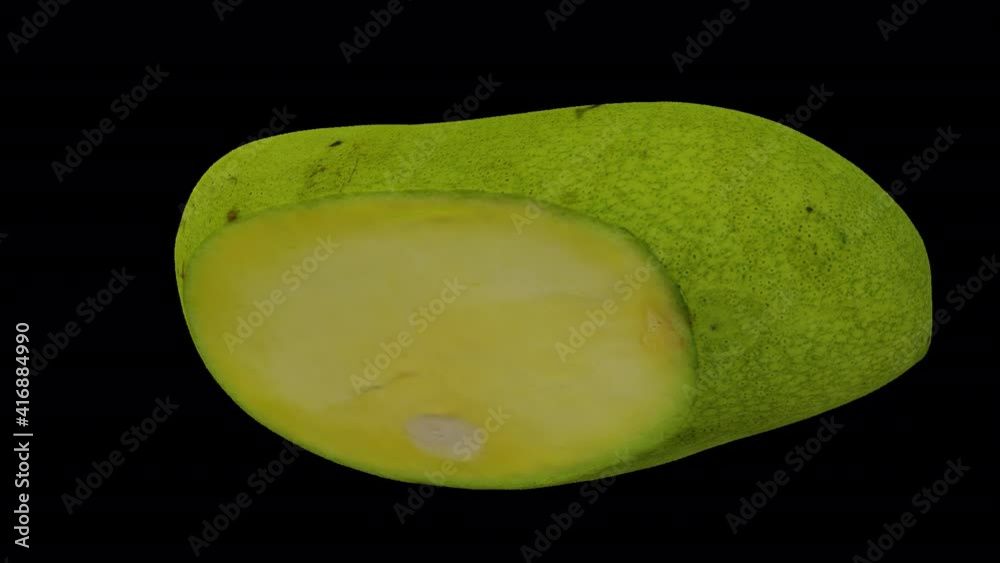 Realistic render of a rotating cut Green (Unripe) Ivory Mango on ...