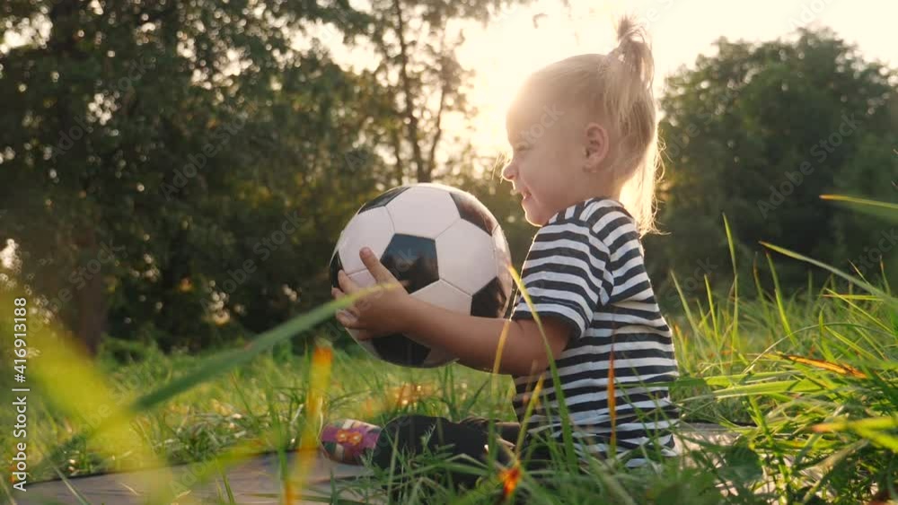 Video Stock little girl in the park playing ball. happy family camping ...
