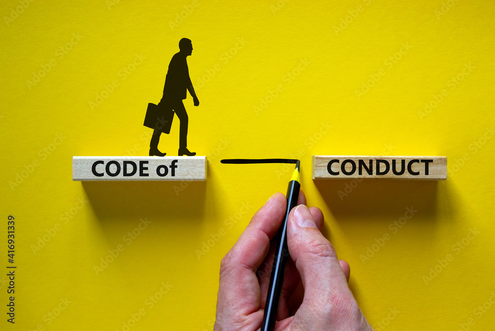 Code of conduct symbol. Wooden blocks with words 'Code of conduct ...