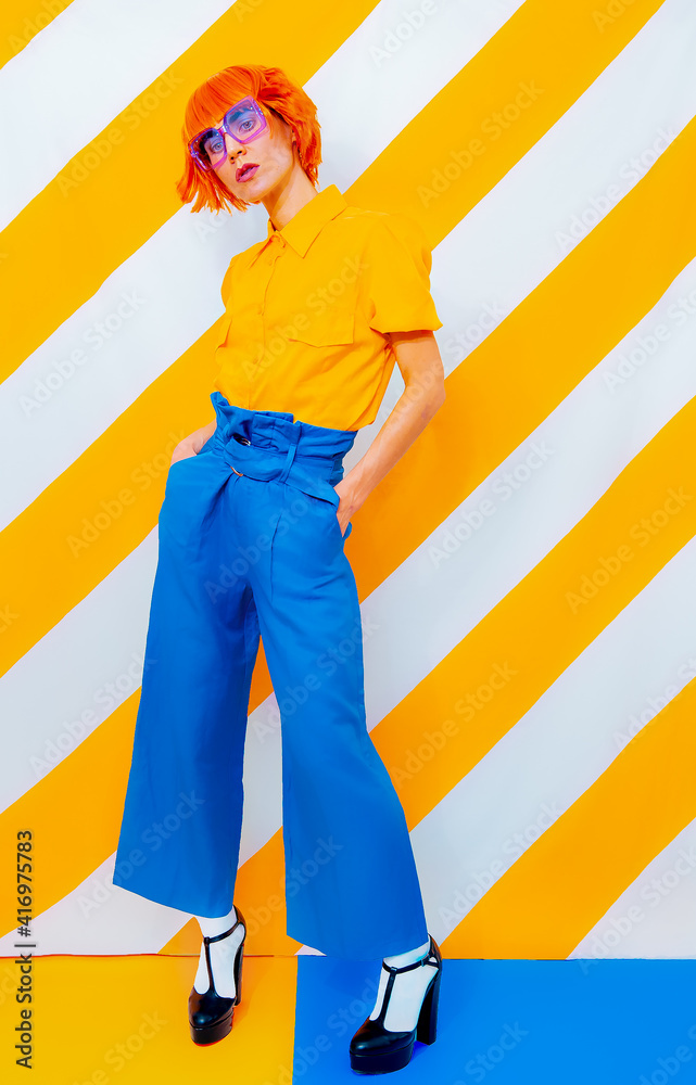 Lady wearing vintage look on trendy striped yellow background. Minimal ...