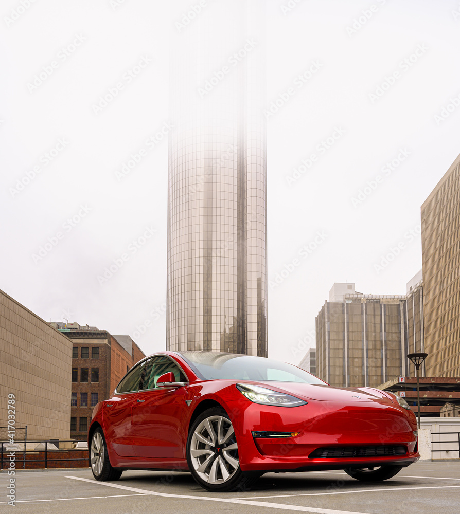 Red Tesla Model 3 on a Foggy Day in Downtown Atlanta on a Rooftop Stock ...