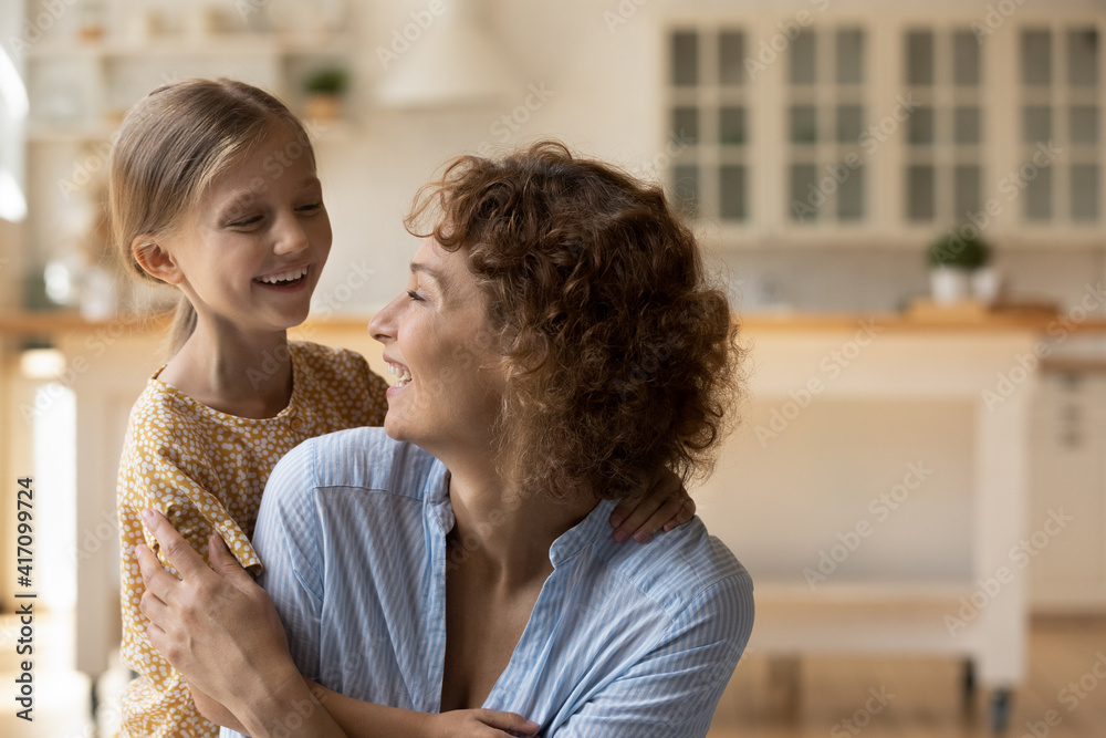 I love you so much. Laughing playful little kid daughter spend time at ...