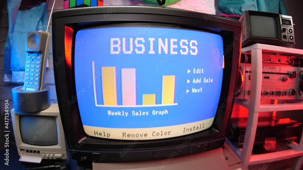 Business graphs and charts on an old vintage computer screen from the ...