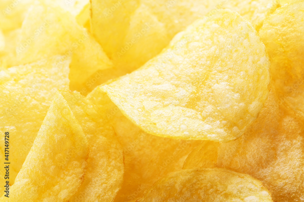 Potato chips pattern. Yellow salted potato chips as food background ...