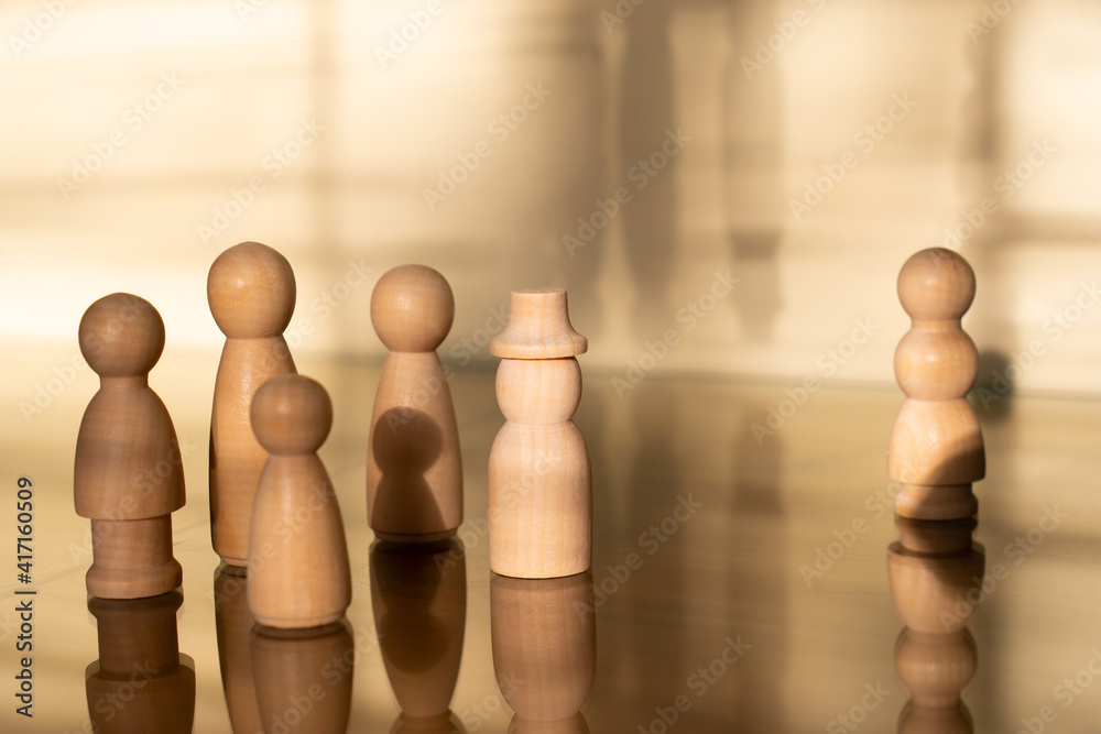 different shape of wooden figure represent diversity of people in the ...