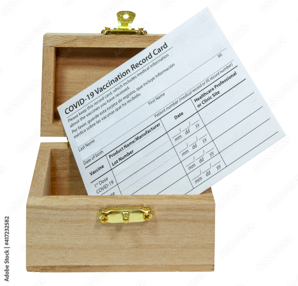 Blank covid vaccination card in a wooden treasure chest. Isolated ...