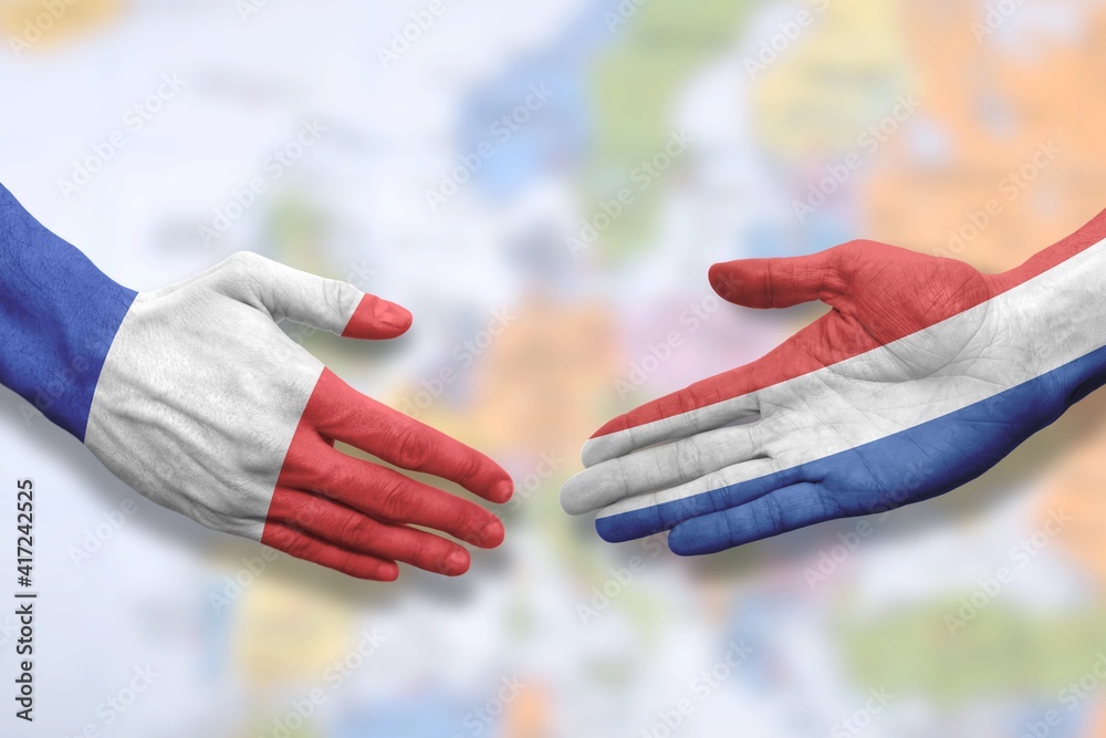 The Netherlands and France - Flag handshake symbolizing partnership and ...
