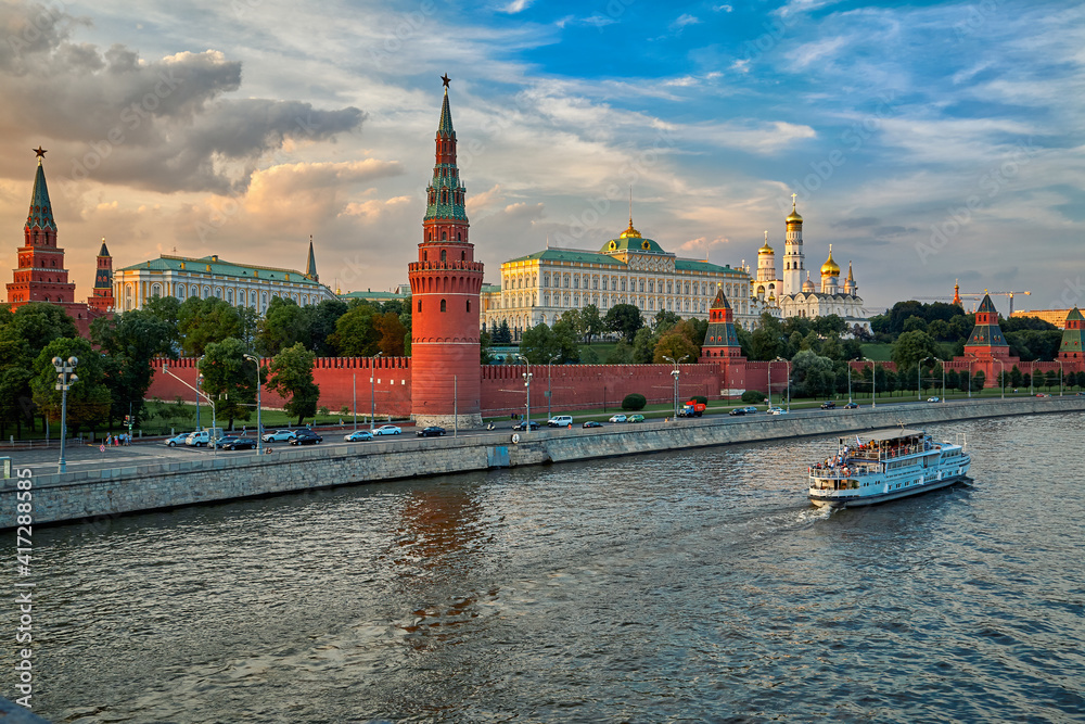 View of the Moscow Kremlin from the Moscow river. Red brick towers and ...
