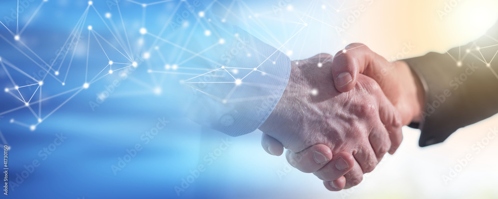 Two men shaking hands in office; panoramic banner Stock Photo | Adobe Stock