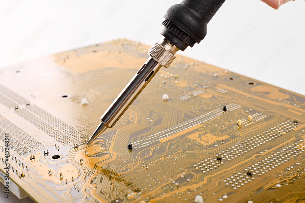 Soldering iron isolated on a white background. A tool for soldering ...