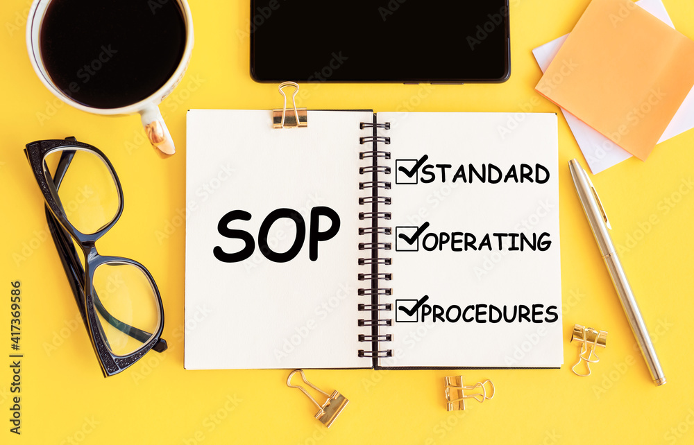Foto de SOP - Standard Operating Procedure, text on notepad and office ...