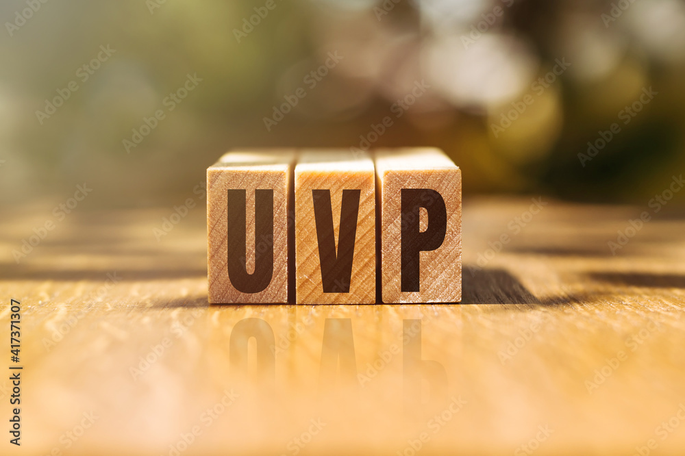 UVP - Unique Value Proposition, word made with building wooden blocks ...