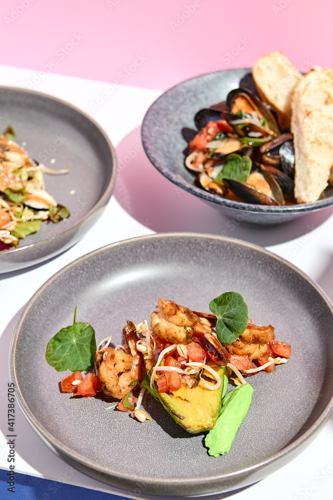 Shrimp and Avocado Grill restaurant plate. Restaurant appetizer food ...