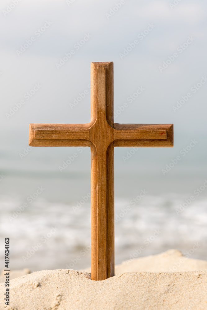 Wooden cross on the beach of the Sea background. Easter concept ...