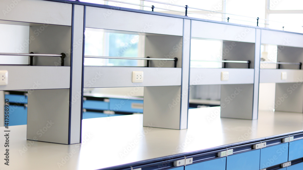 Blue bench laboratory in chemistry laboratory room for doing the ...
