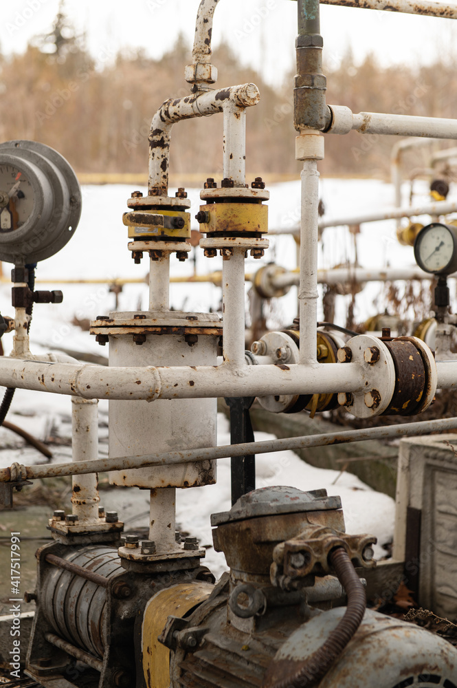 old gas installation at a filling station, gas pipeline, old pipes ...
