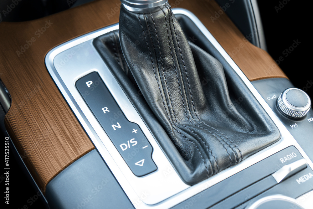 Automatic gear stick of a modern car. Modern car interior details ...