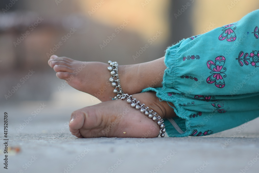 Legs of the child, a girl giving pose for a photoshoot Stock-Foto ...