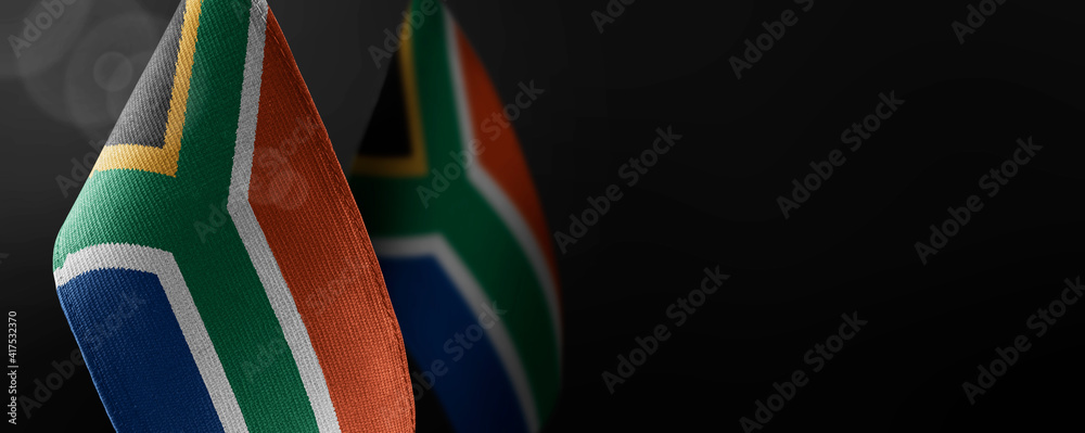 Small national flags of the South Africa on a dark background Stock ...