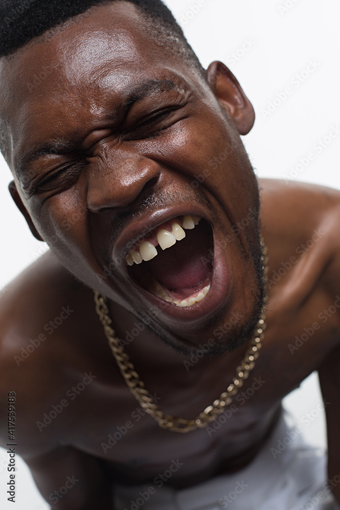 Emotional portrait of an African man on white background. Black guy ...