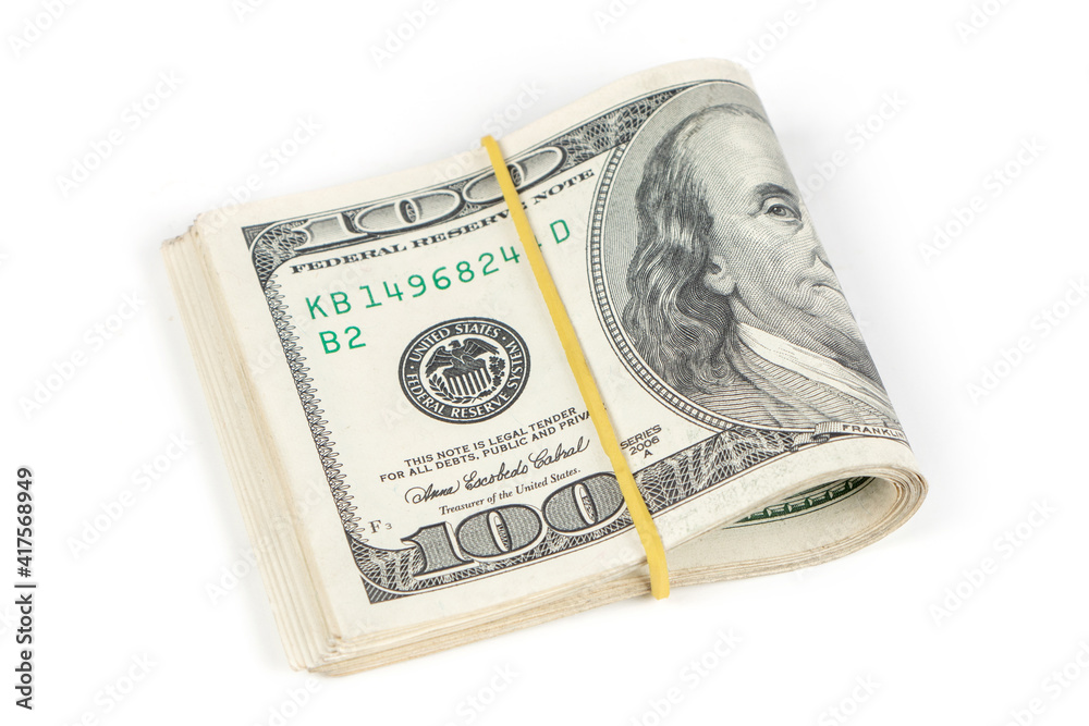 Big Stack Of Folded Hundred Dollar Bills Isolated On White Background big-stack-of-folded-hundred-dollar-bills-isolated-on-white-background