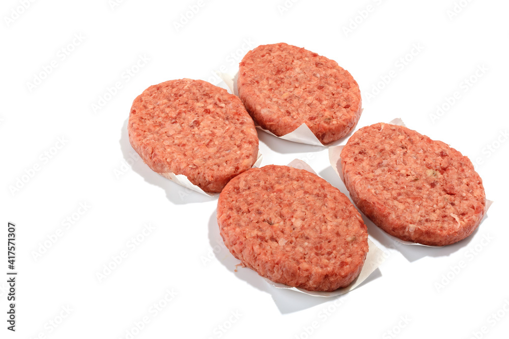 Raw beef patties for making a burger.Isolated on a white background ...