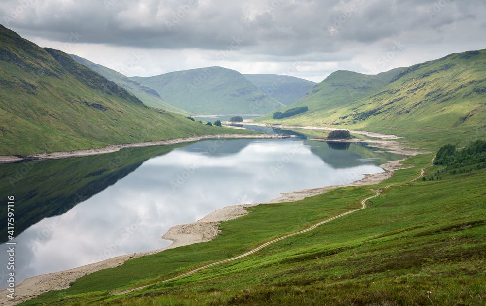 Loch Daimh with the mountain summits of Meallan Odhar to the left and ...