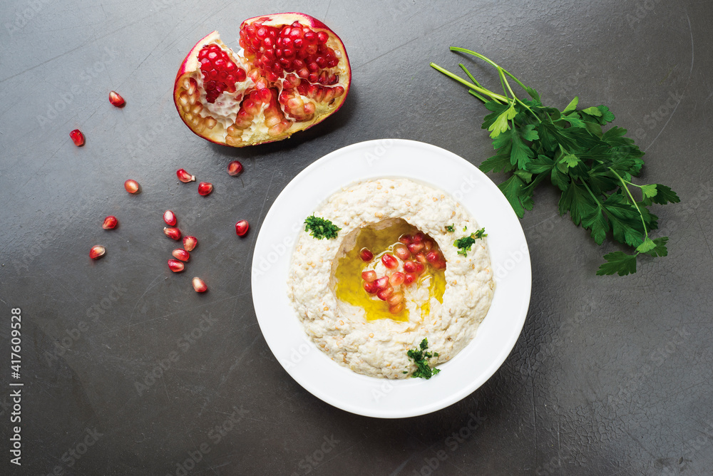 Mutabbal, Lebanese food of cooked eggplant with pomegranate. Stock ...