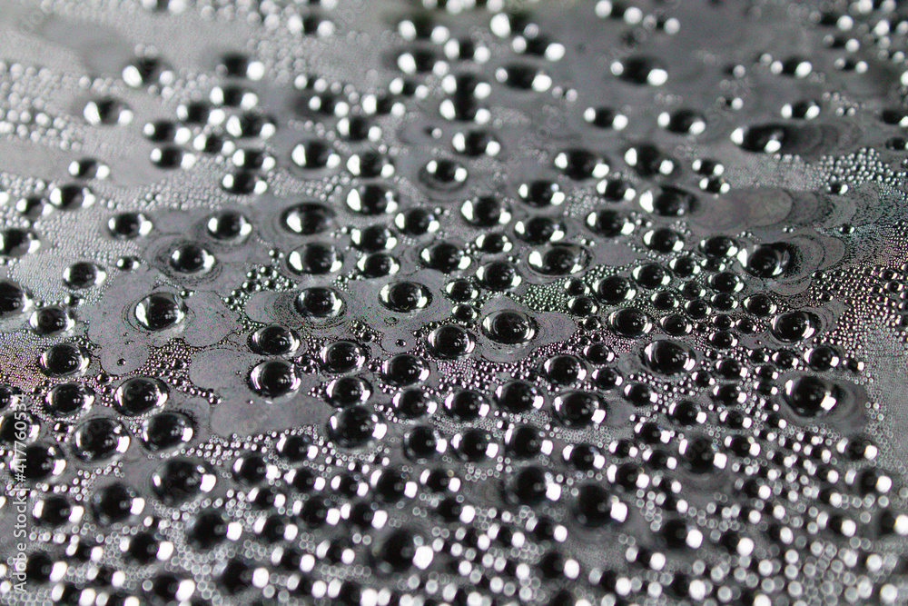 Water droplets on the film. Evaporation of moisture on a transparent ...