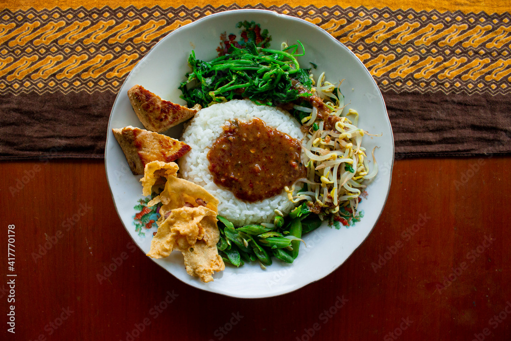 Nasi Pecel or sego pecel is Traditional Javanese rice dish of steamed ...