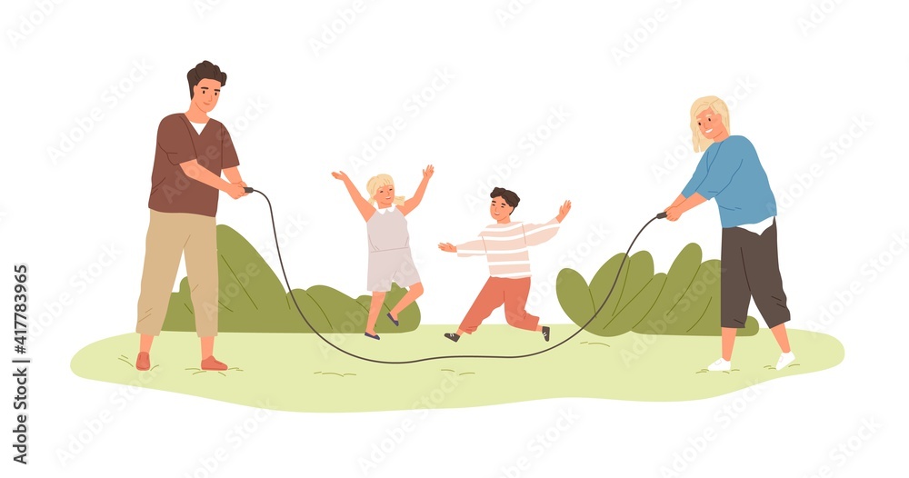 Happy active kids jumping over skipping rope, held by parents. Family ...
