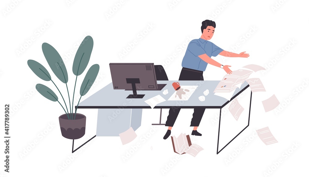 Awkward employee standing at office desk with papers falling down on ...
