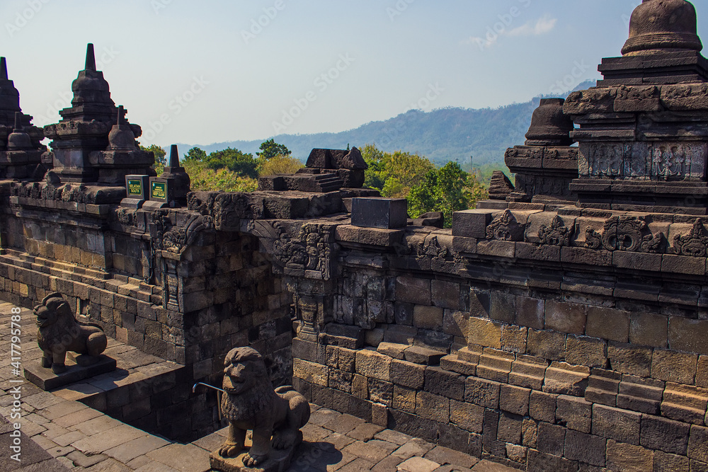 Beautiful stone carvings on the side facades of Buddhist Borobudur ...