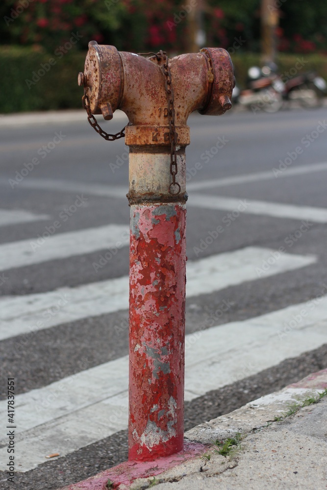 Broken red fire hydrant Stock Photo | Adobe Stock