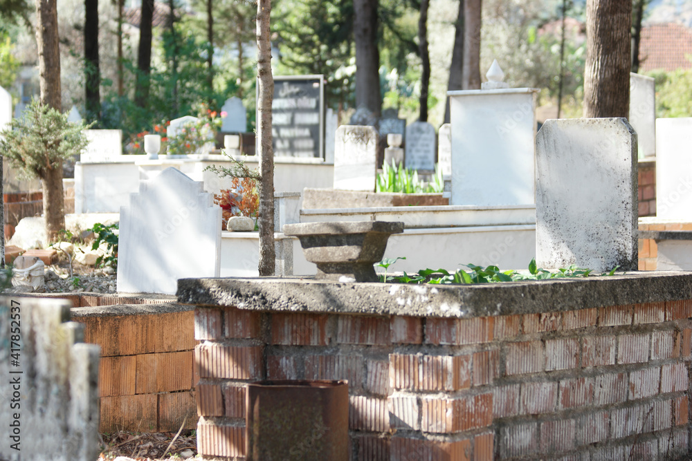 Graves and headstones at Muslim cemetery. Graveyard tombstones in ...