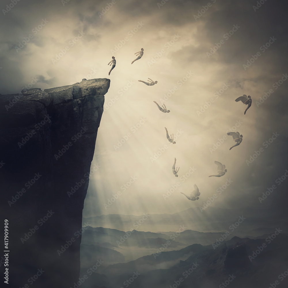 Surreal scene, determined man jumping off a cliff, fighting his fears, being confident the wings ...