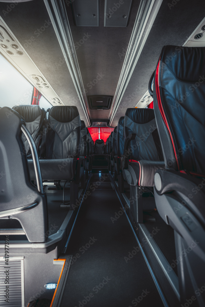 A vertical wide-angle view of an empty interior of a regular intercity ...