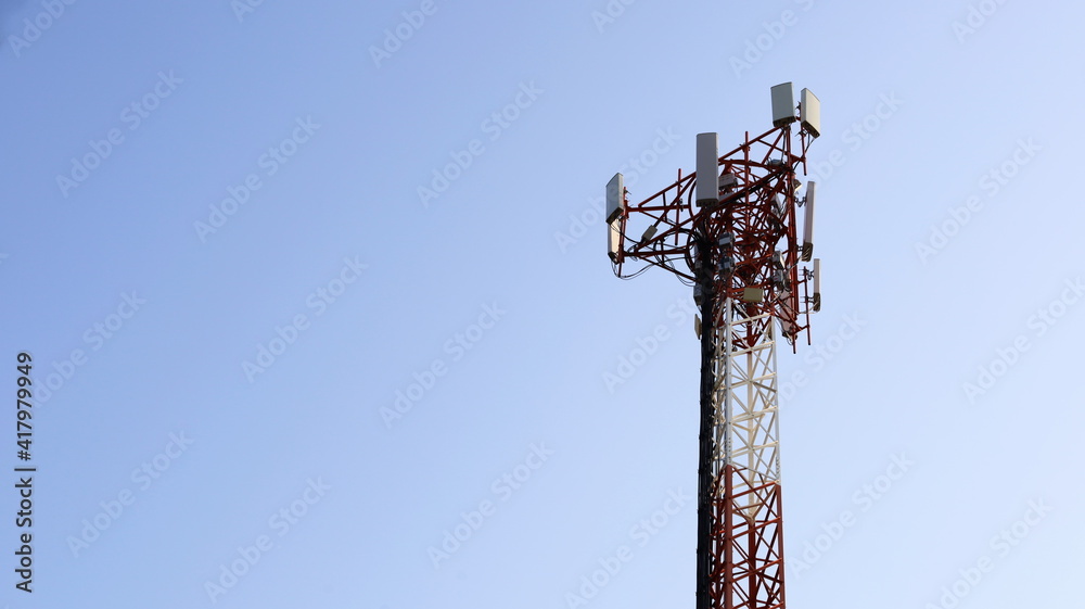 Telecommunication towers. A 4 G or 5 G wireless telephone communication ...