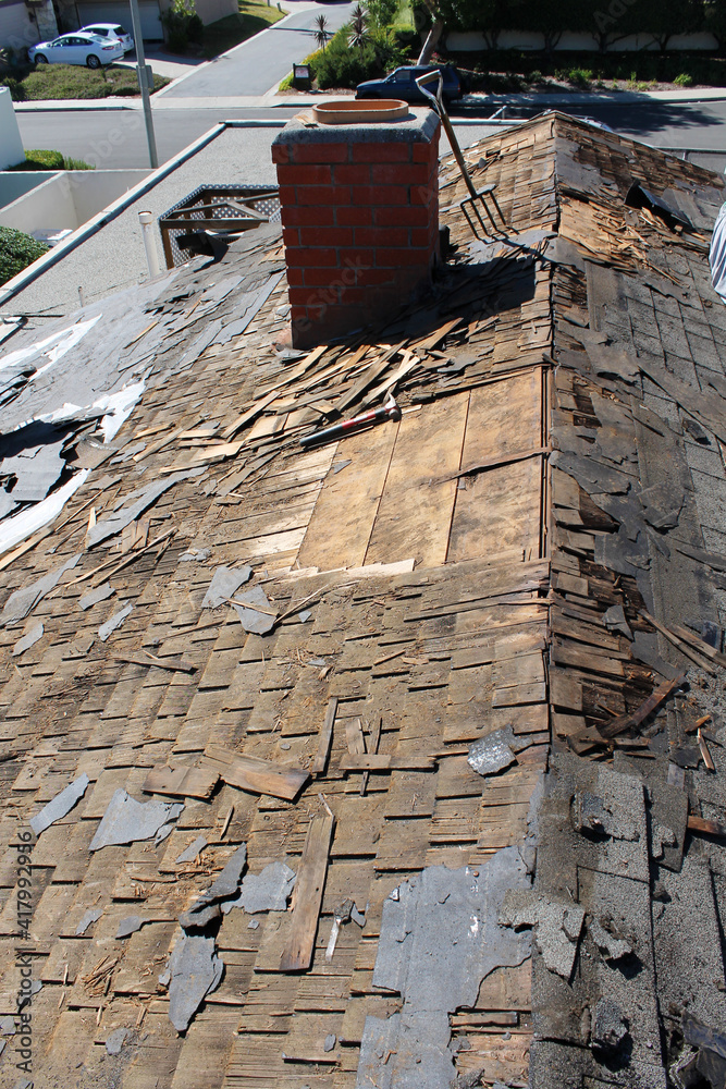 Demolition and removal of an Old Asphalt Single roof that was installed ...