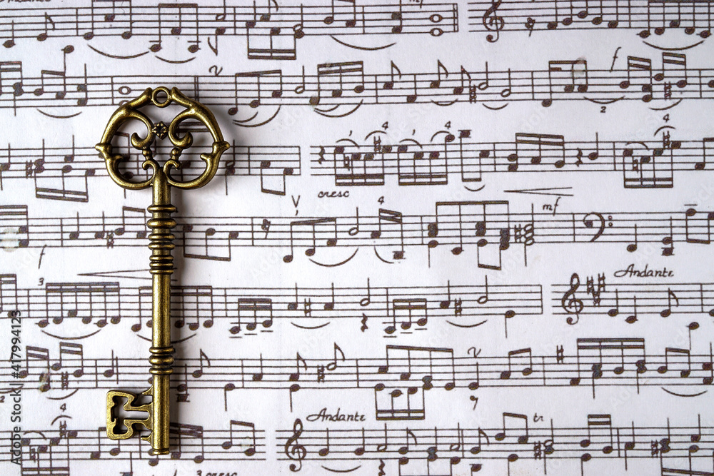 Key shapes making a abstract background using bronze antique keys layed ...