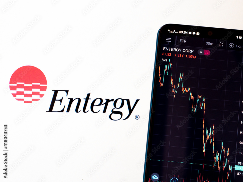 In this photo illustration the stock market information of Entergy ...